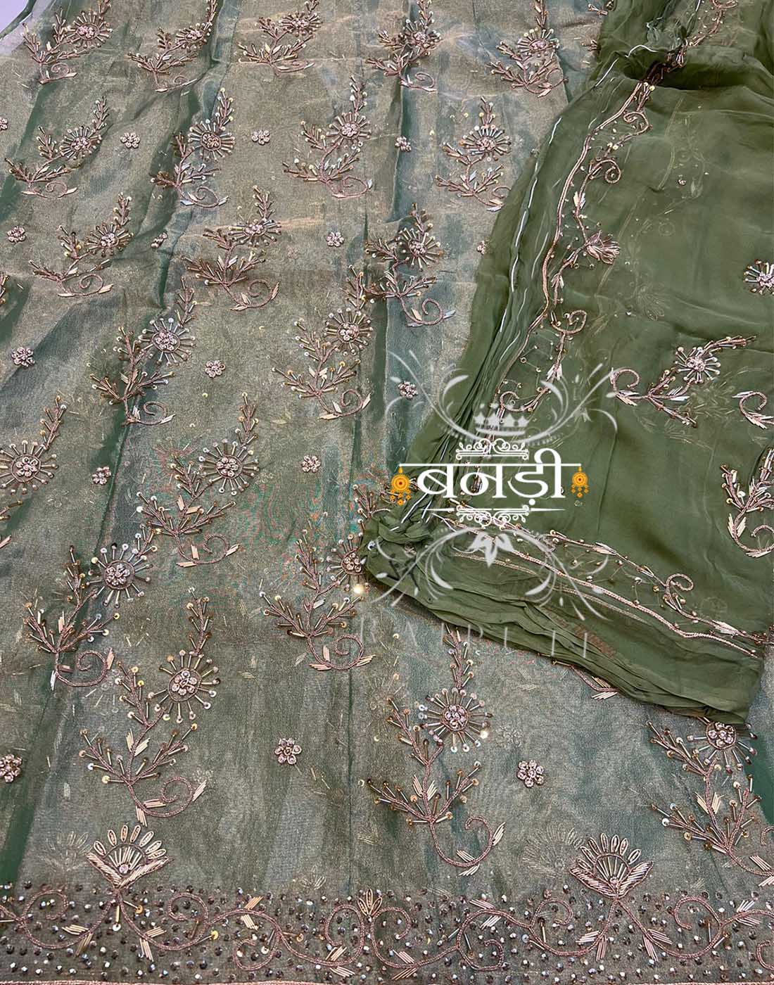 Tissue Poshak in Mehandi Green Color with Heavy Dabka Work